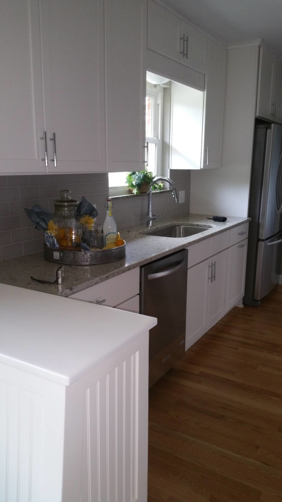 White painted kitchen cabinets - Cabinets2Countertops